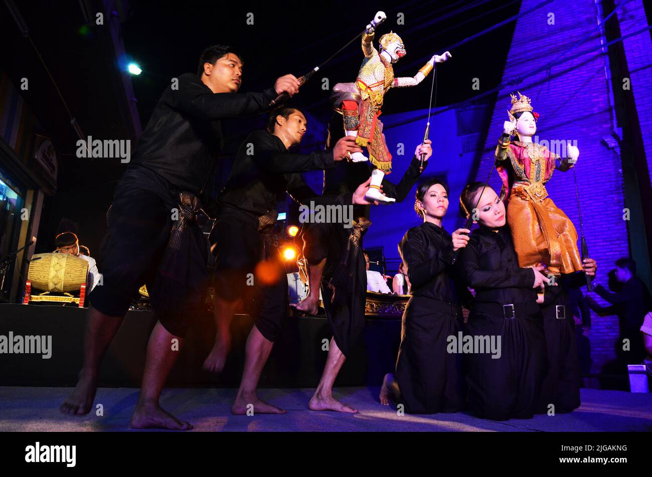 Thai professional puppeteer or Puppet master manipulate playing acting ...