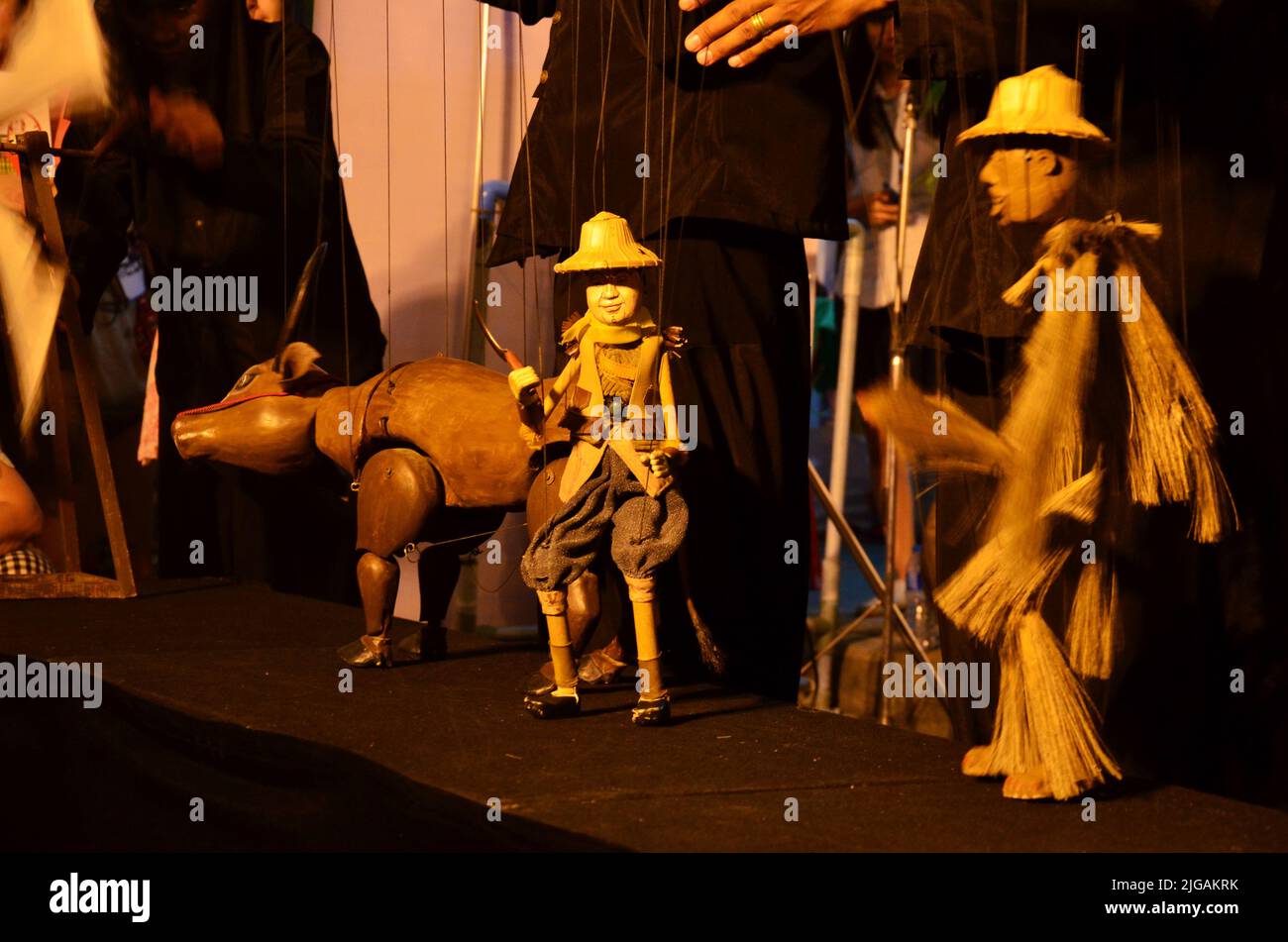 Thai professional puppeteer or Puppet master manipulate playing acting ...