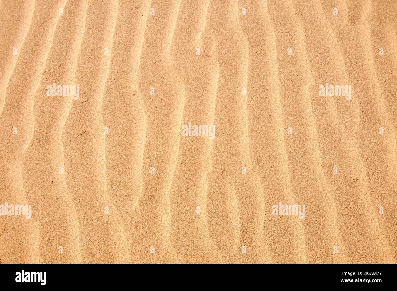Rippled sand texture background Stock Photo - Alamy
