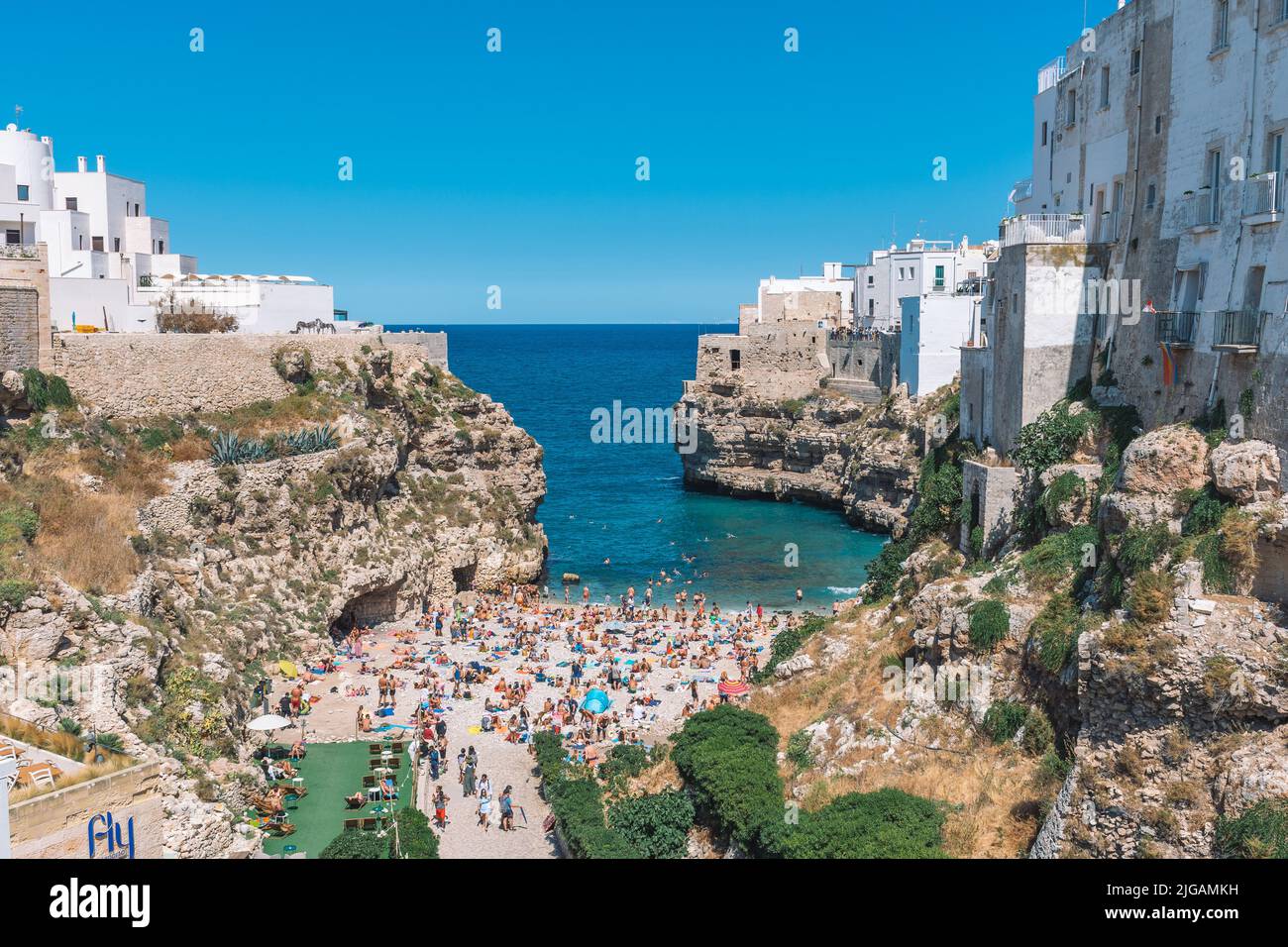 Beautiful aerial view of Polignano a Mare with white stone houses ...