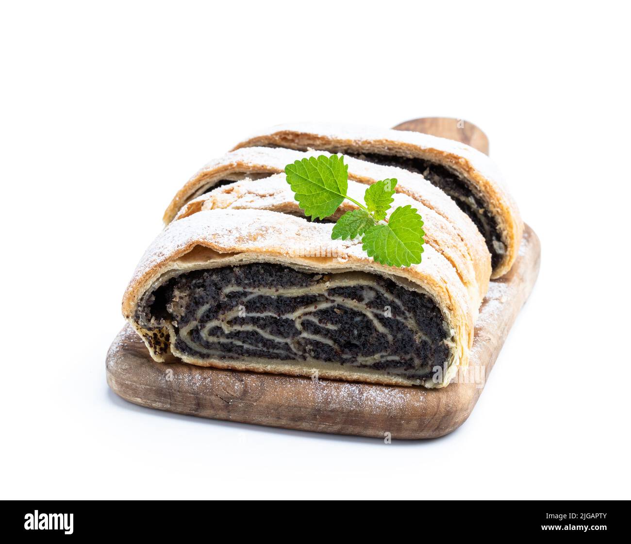 Homemade poppy seed strudel slices isolated on white Stock Photo - Alamy
