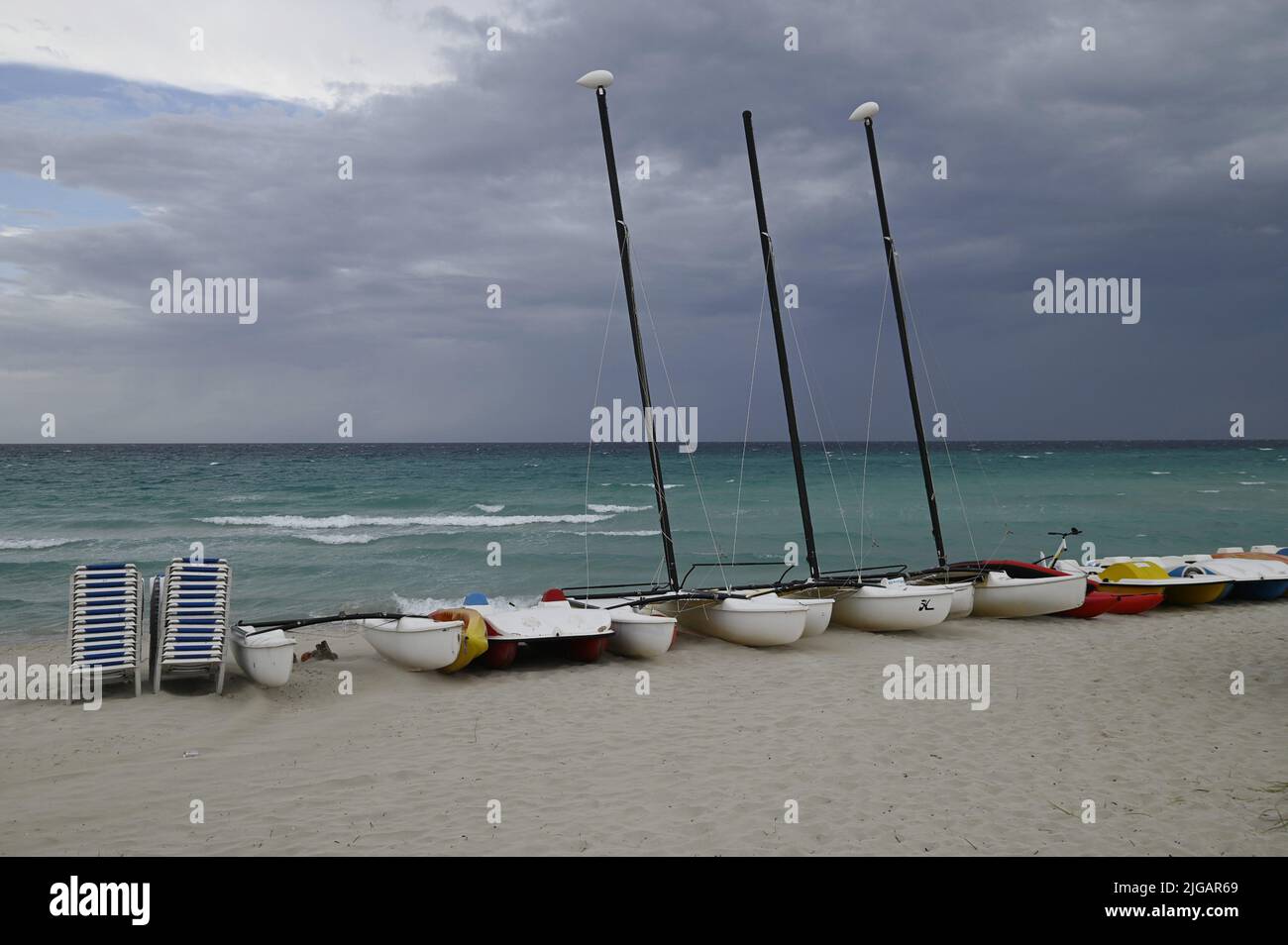 Seascape with scenic view of Catamaran sailing boats on the sandy ...