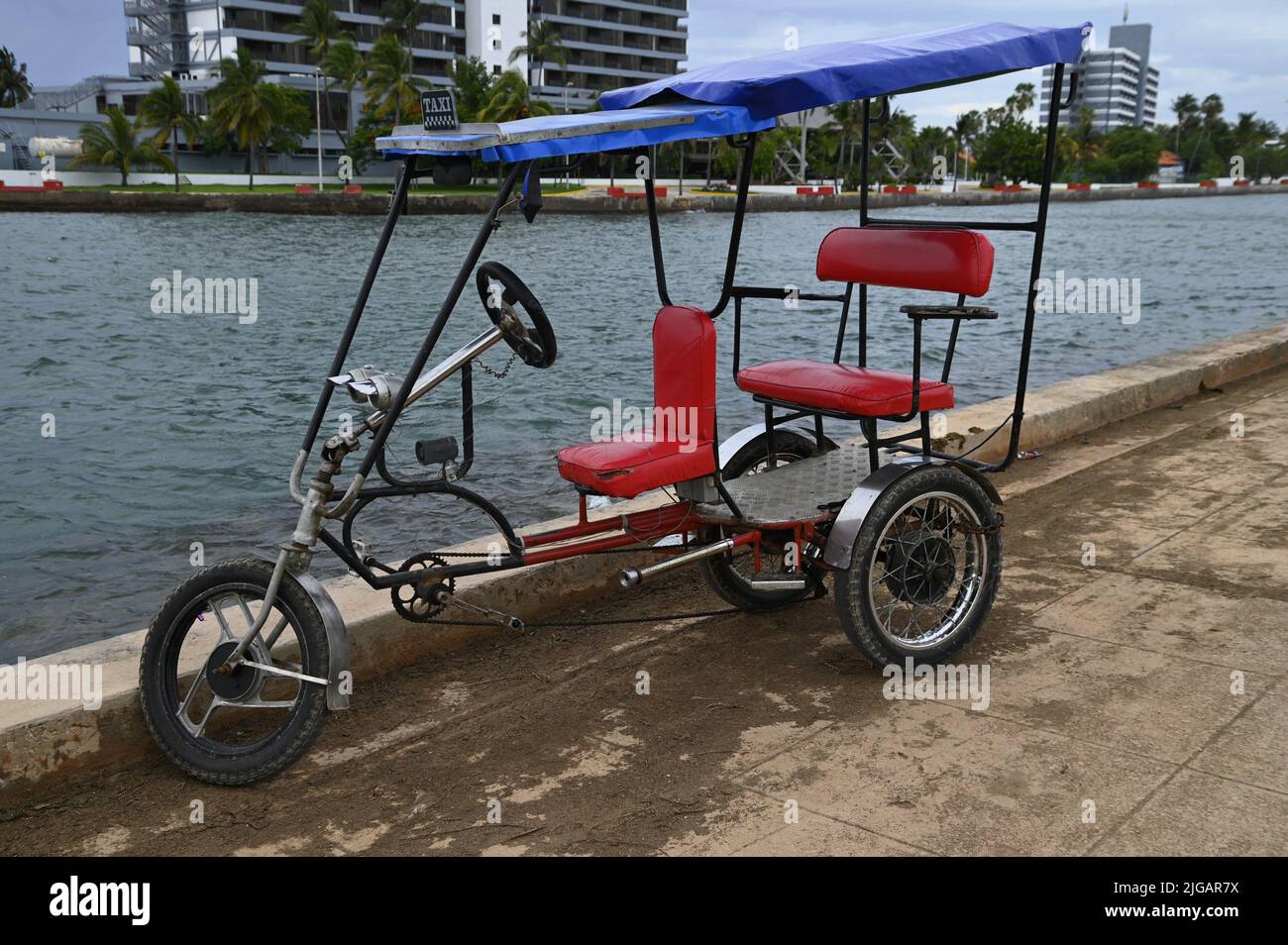 Landscape with scenic view of a local typical bicitaxi in Varadero ...