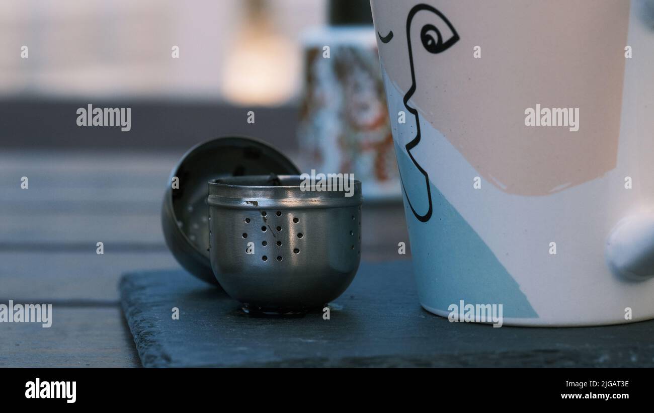 Open small teapot in closeup Stock Photo - Alamy