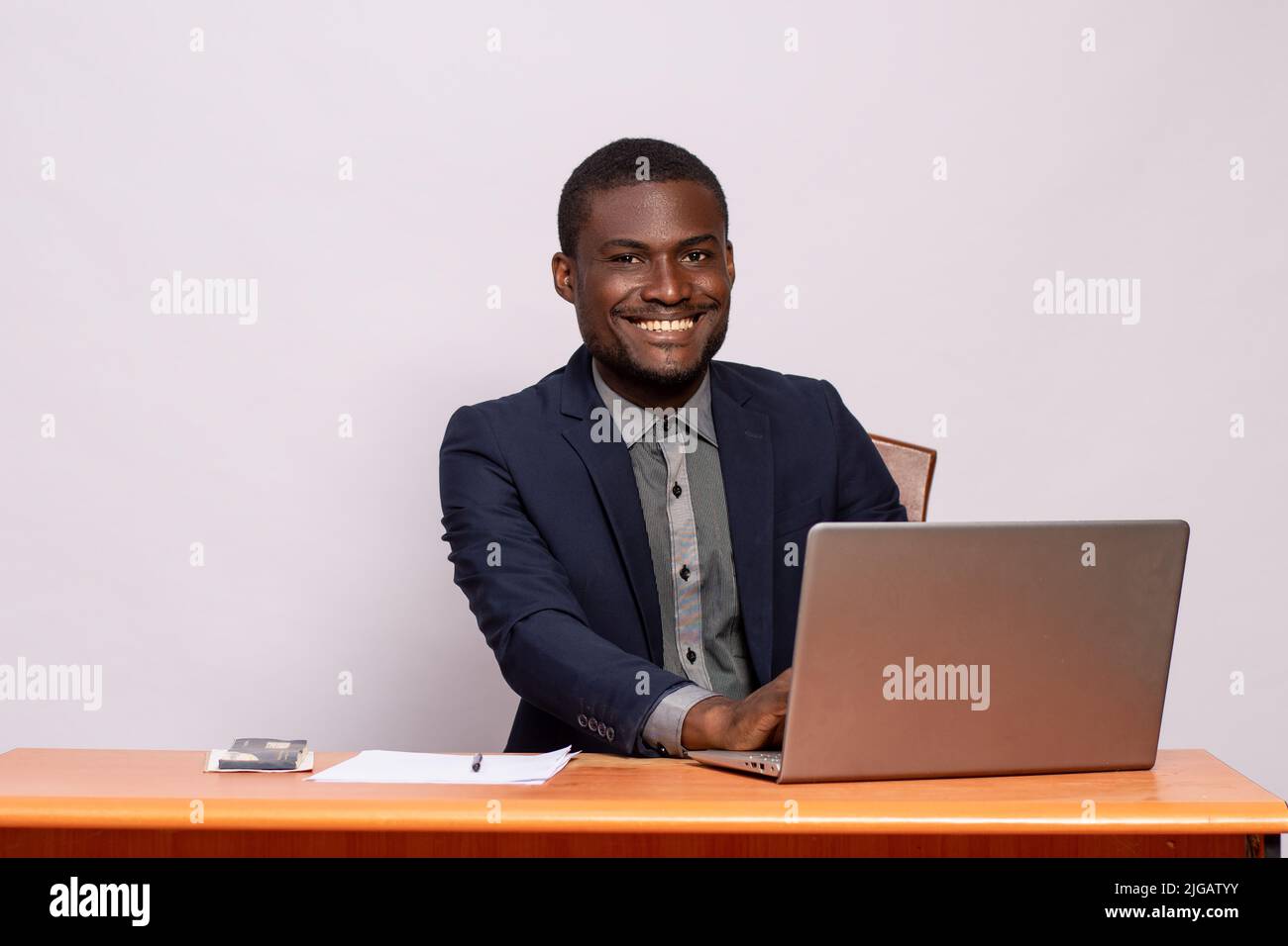 Positive delighted man typing hi-res stock photography and images - Alamy