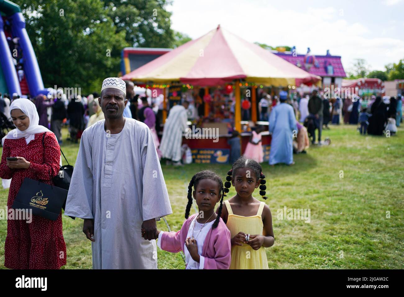People enjoy a funfair at Small Heath park in Birmingham, for Eid al ...
