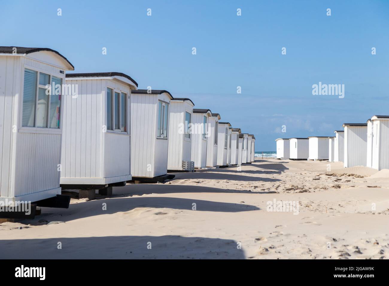 White beach houses in Denmark Stock Photo - Alamy