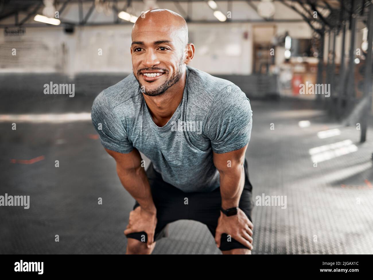 Go Until You Cant Anymore A Young Man Taking A Break During A Workout To Catch His Breath Stock