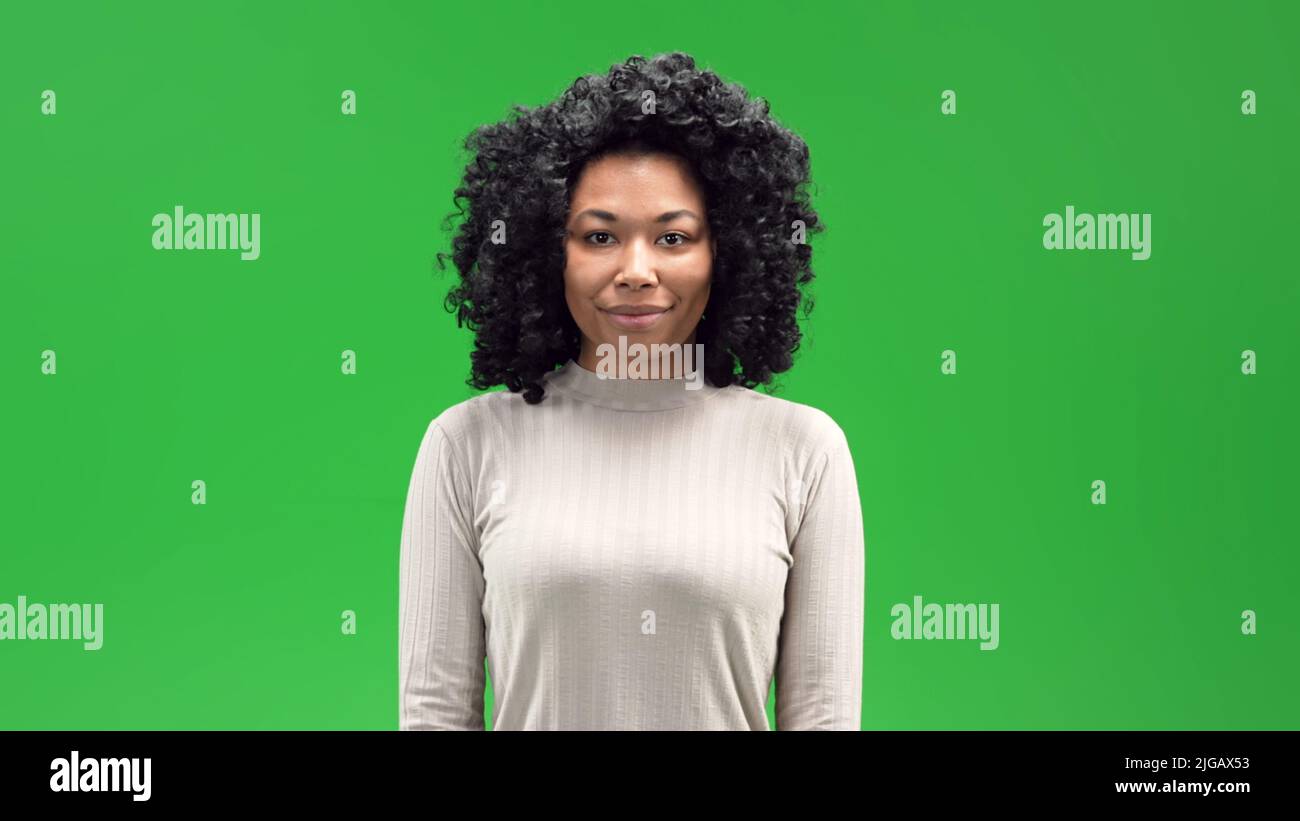 The portrait of a confident African American model looking straight at ...