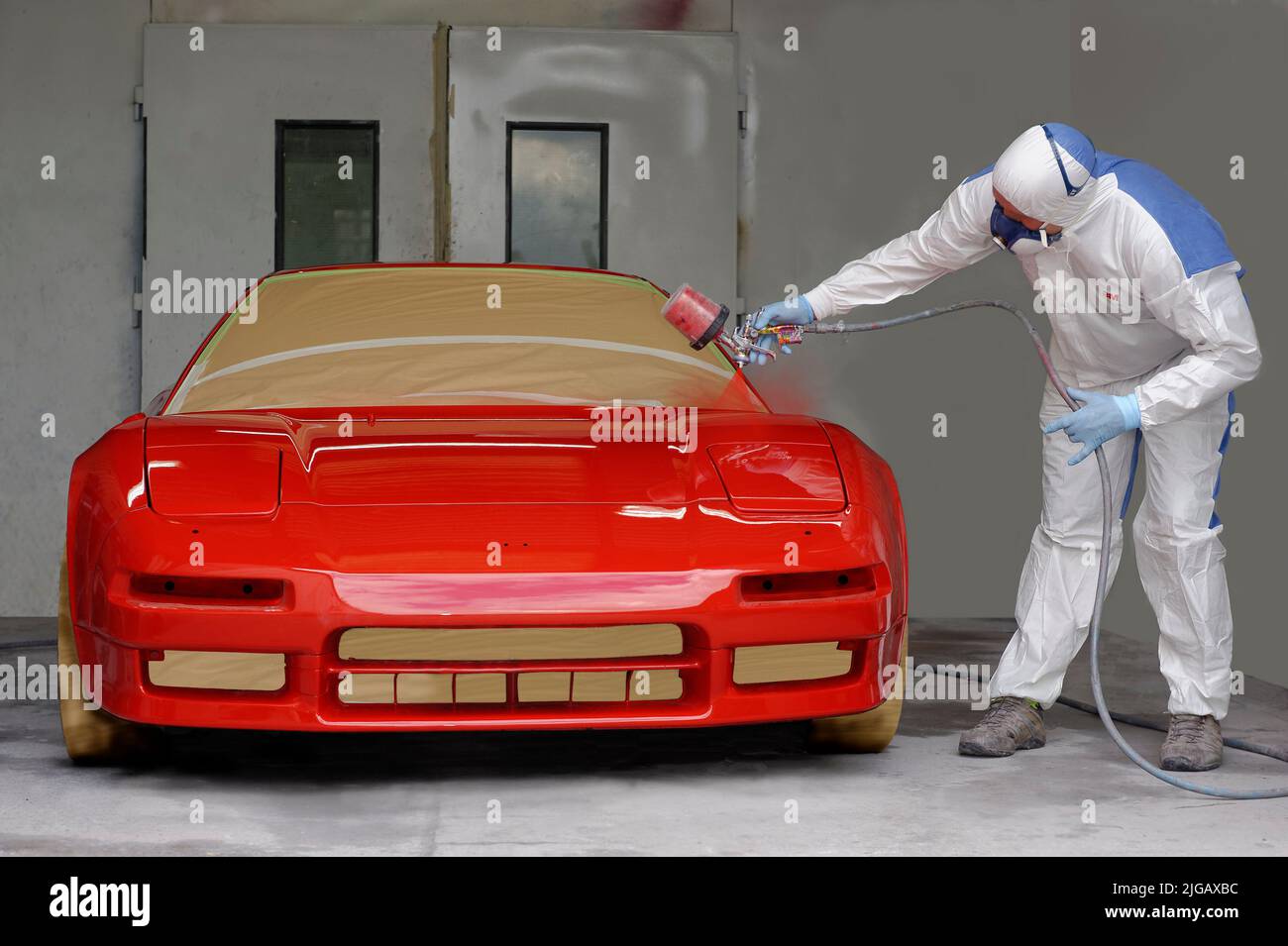 Car repairs and body shop. Car receiving a full body re-spray follow ...