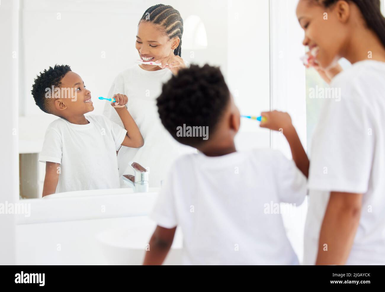 Black Kids Brushing Teeth