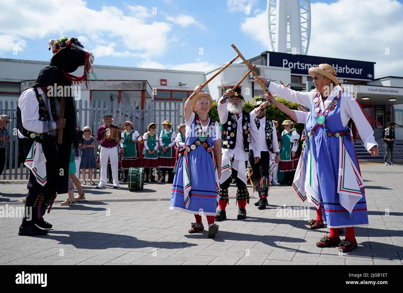 Members of Fishbourne Mill Morris perform outside Portsmouth Harbour ...