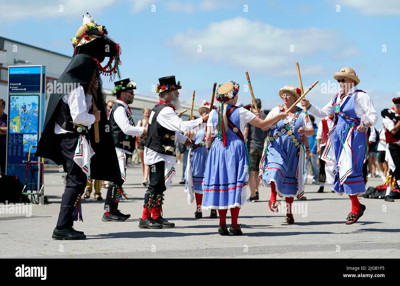 Members of Fishbourne Mill Morris perform outside Portsmouth Harbour ...