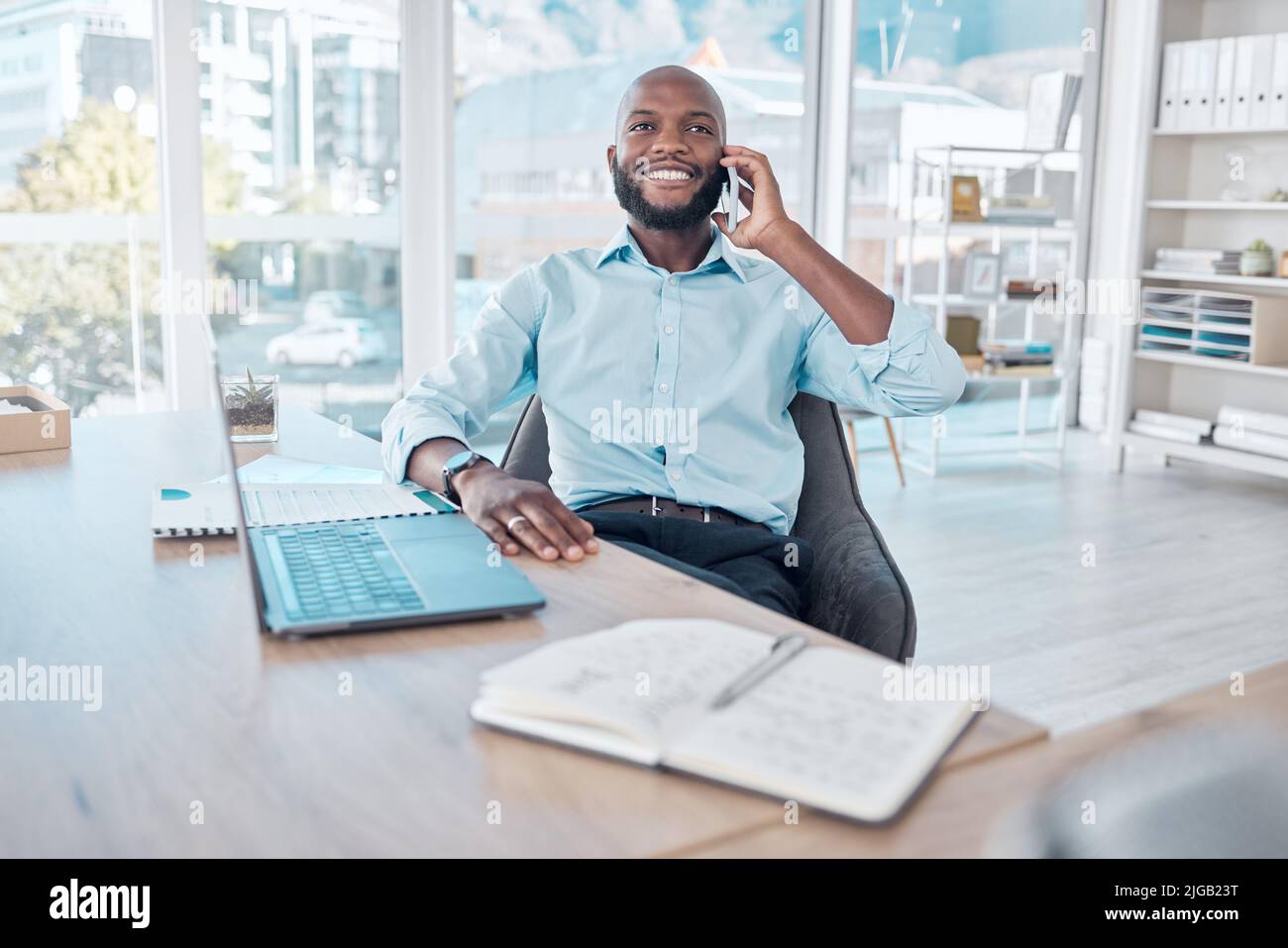 Getting together with incredible minds. a young businessman using his ...