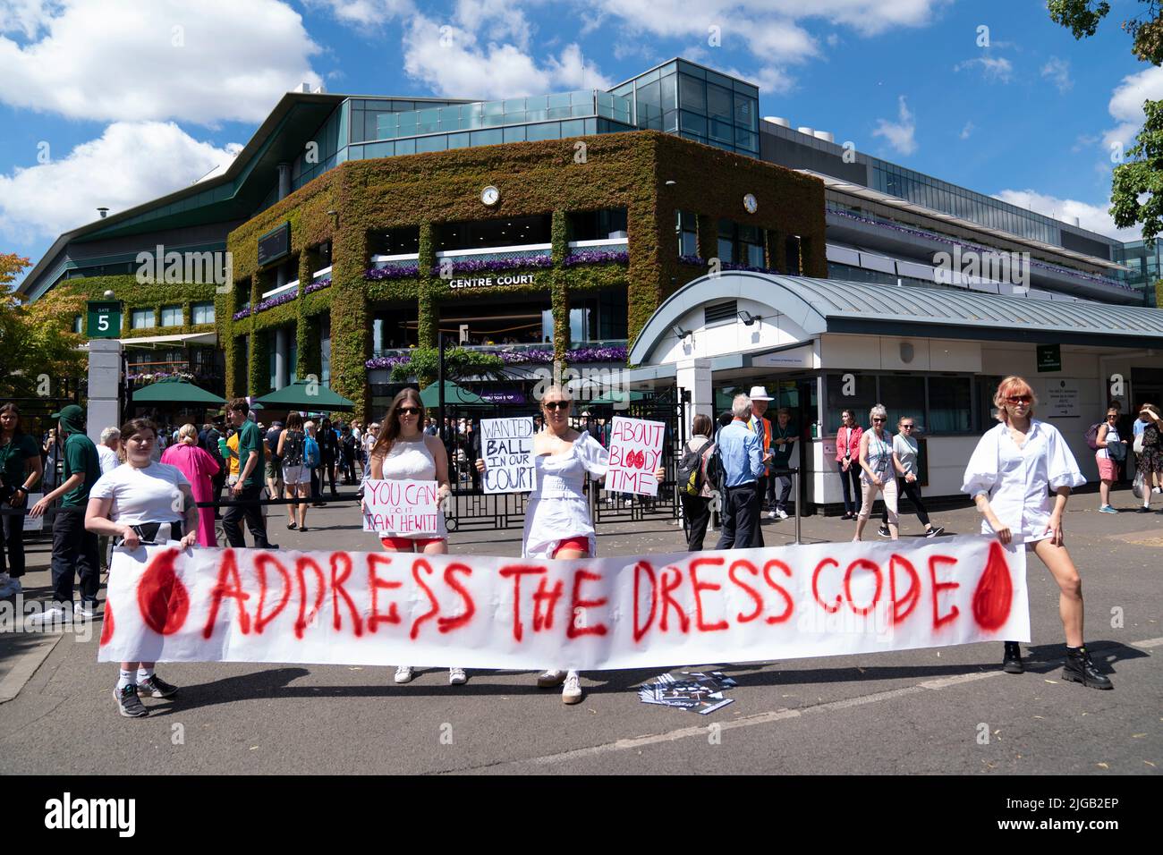 Campaigners from Address The Dress Code outside the main gate at ...