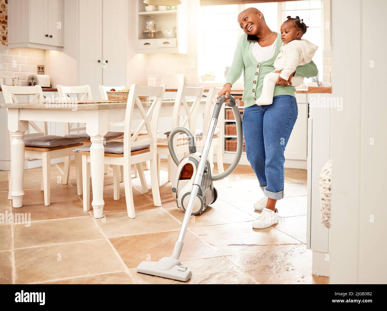 A single mom can do it all. Full length shot of an attractive young ...