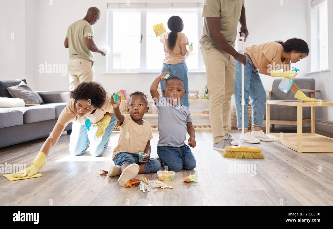 Cleanliness comes first with kids around. two adorable little boys ...