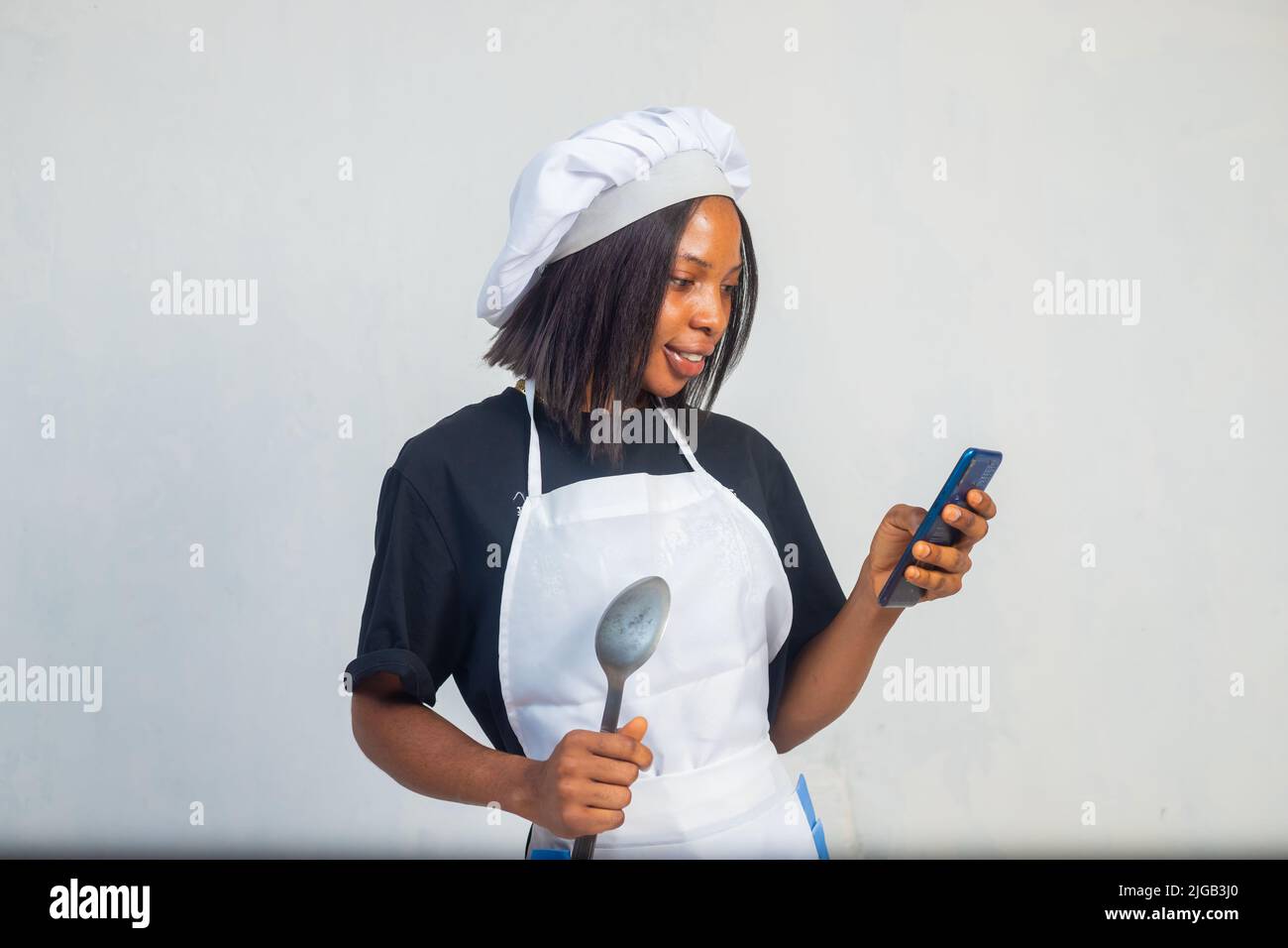 cooking, culinary and people concept - happy smiling female chef in ...