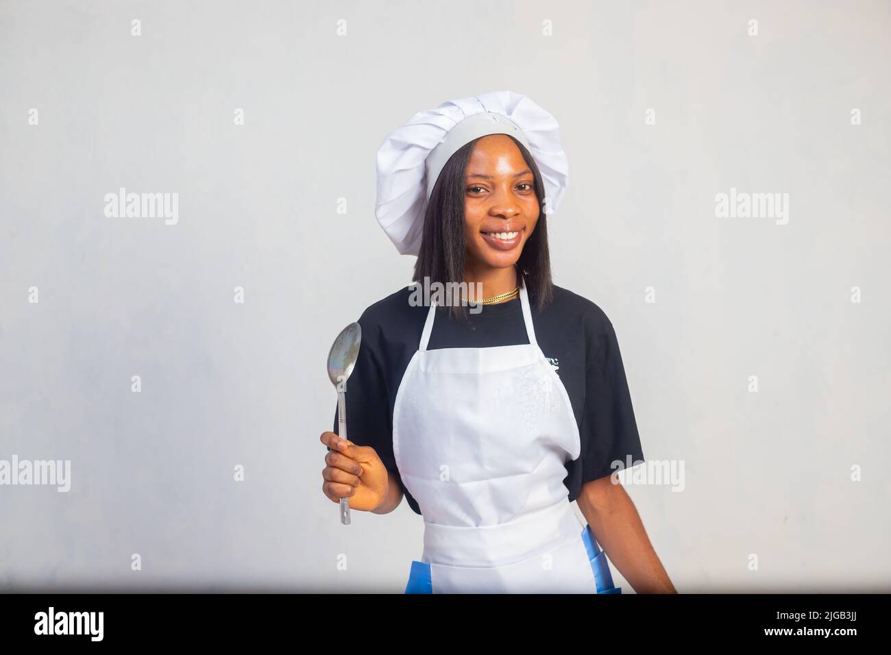 cooking, culinary and people concept - happy smiling female chef in ...