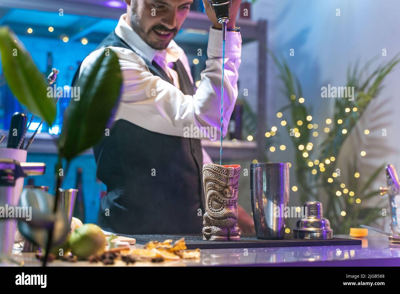 Young barman hi-res stock photography and images - Alamy