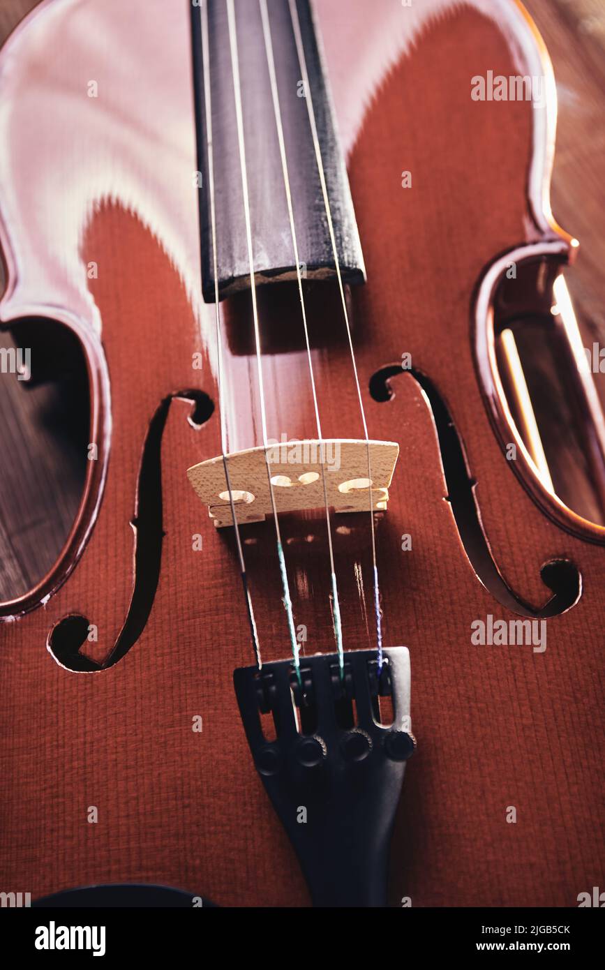violin on an old wooden background Stock Photo - Alamy