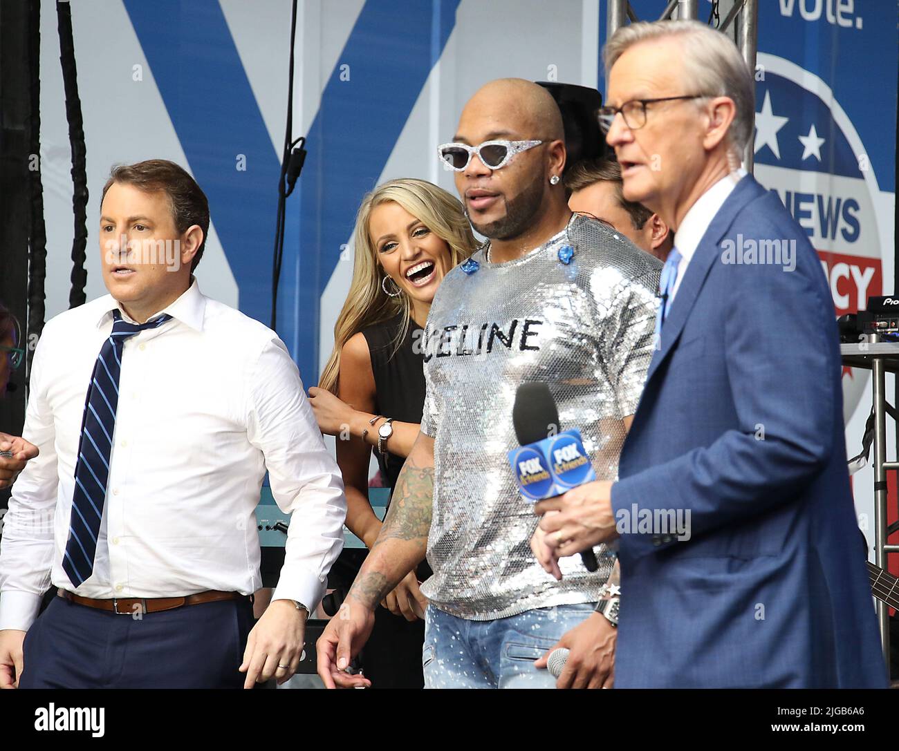 New York, NY, USA. 8th July, 2022. Todd Piro, Flo Rida and Steve Doocy pictured as Flo Rida ...