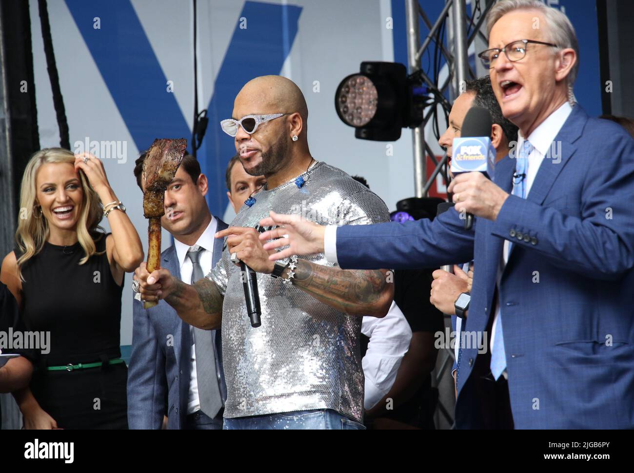 New York, NY, USA. 8th July, 2022. Ainsley Earhardt, Adam Klotz, Flo Rida, Steve Doocy, pictured ...