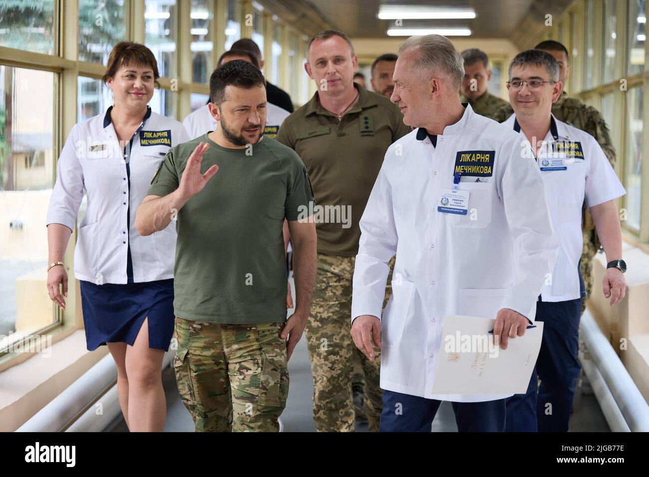 Ukrainian President Volodymyr Zelenskyy, 2nd left, is escorted by Dr ...