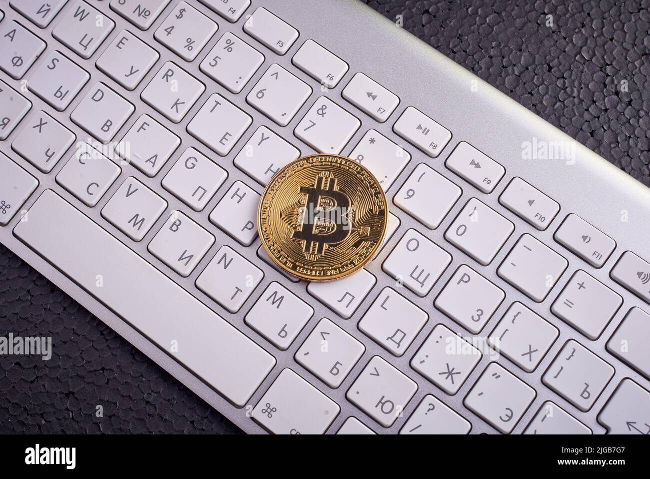 Golden coin on white hi-res stock photography and images - Alamy