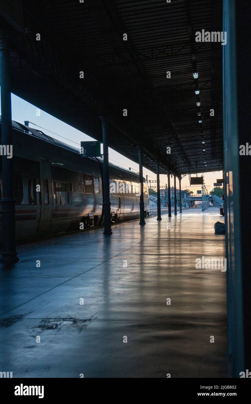 Train Station of Granada at Sunset with the Sierra Nevada mountains in ...