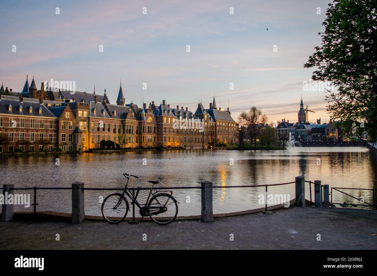 The Het Binnenhof building in Netherlands during sunset Stock Photo - Alamy