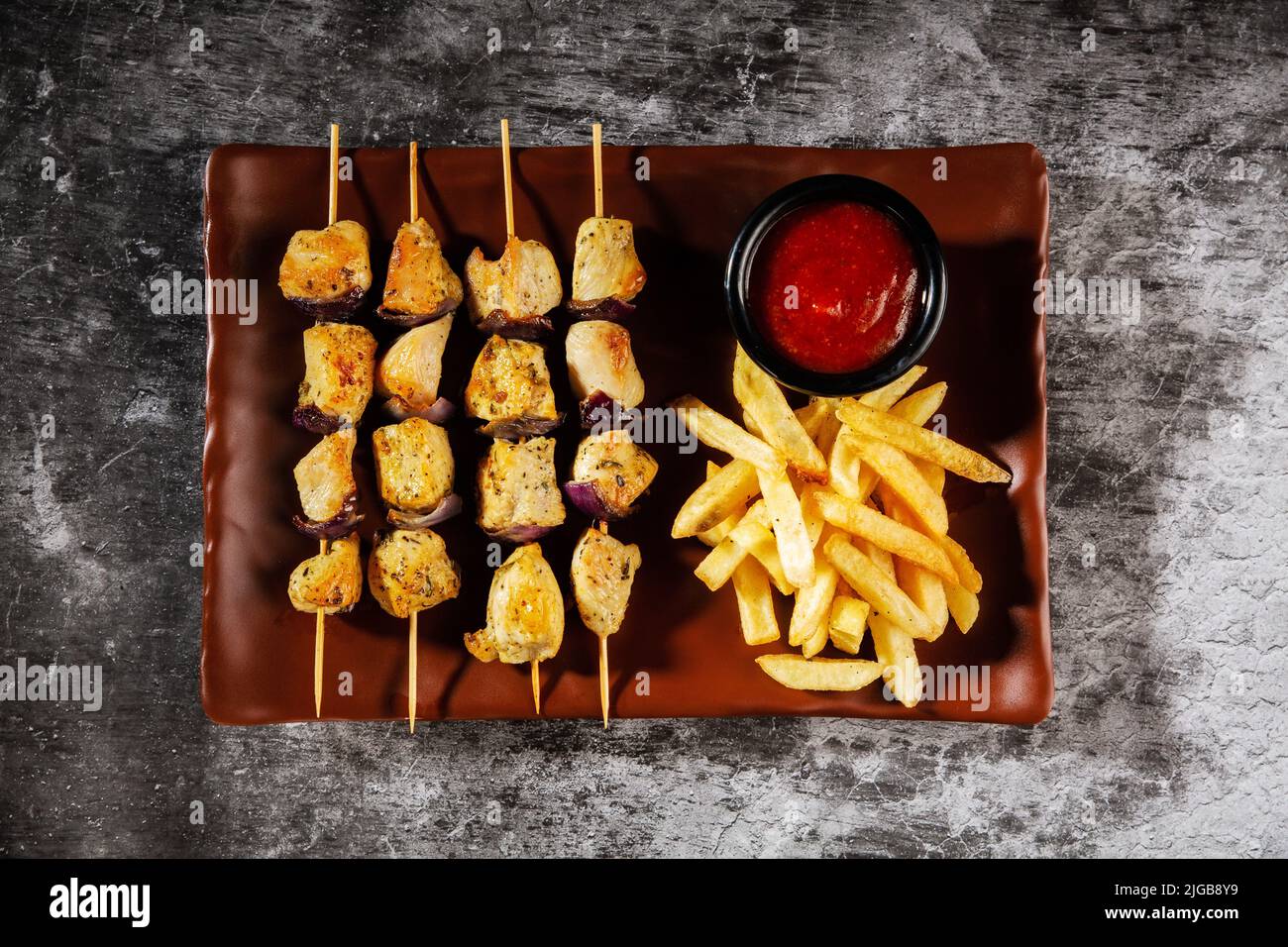 Chicken skewers. Pieces of tender chicken fillet, grilled with sweet ...