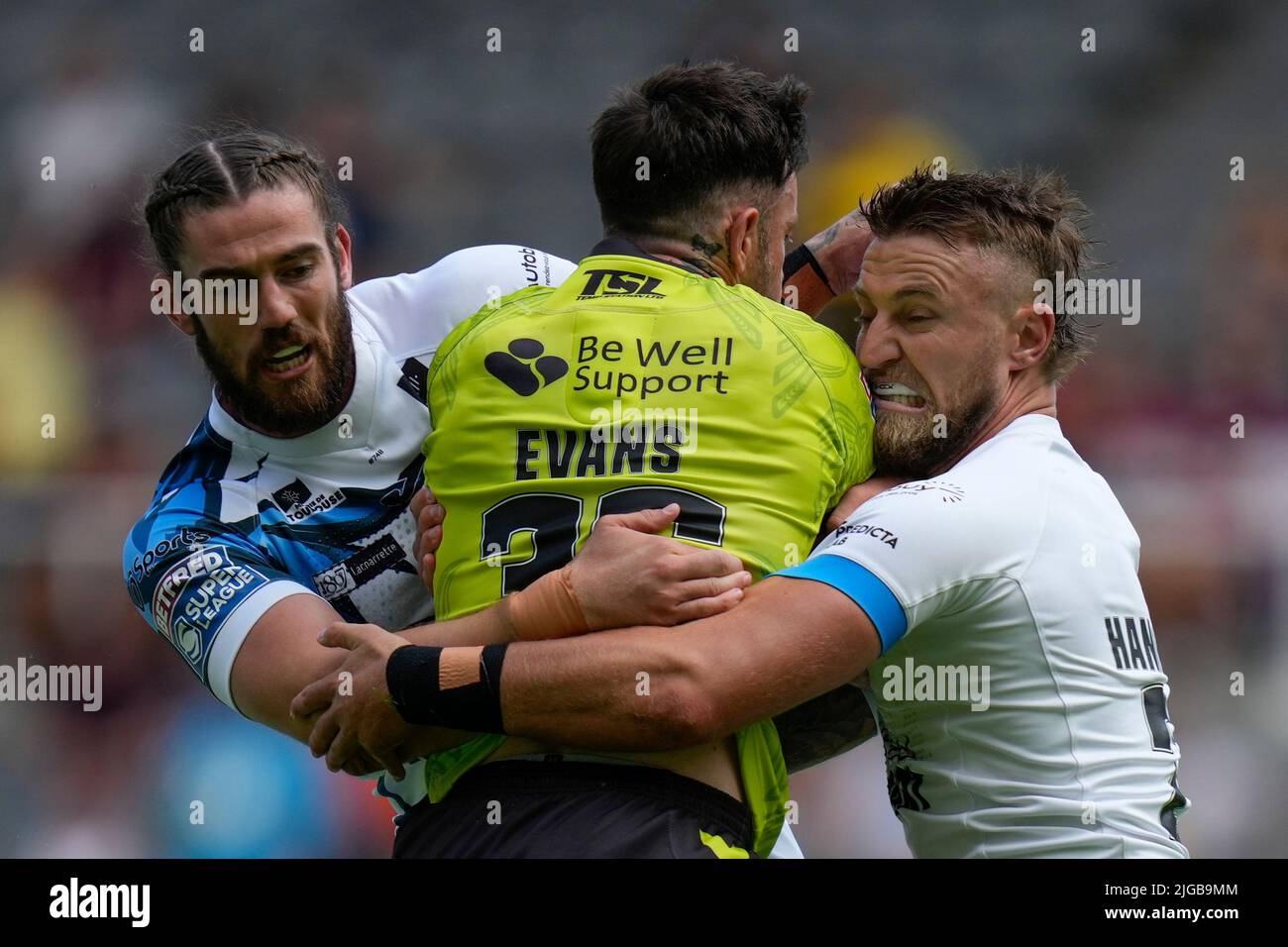 Chris Hankinson #21 and , Joe Bretherton of Toulouse Olympique tackle ...