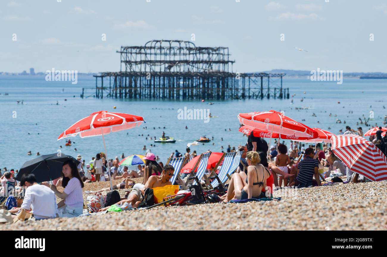 Brighton UK 9th July 2022 - Crowds on Brighton beach in beautiful hot ...