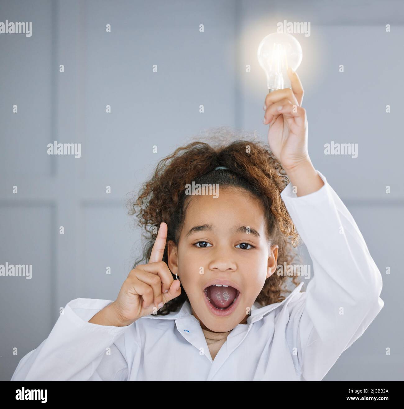 Child lightbulb hi-res stock photography and images - Alamy
