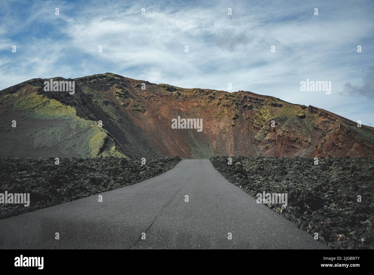 road leading into crater of a volcano on lanzarote timanfaya Stock ...