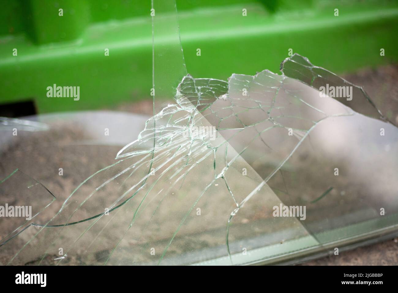 Broken glass. Shards of glass in building. Damaged window. Broken ...