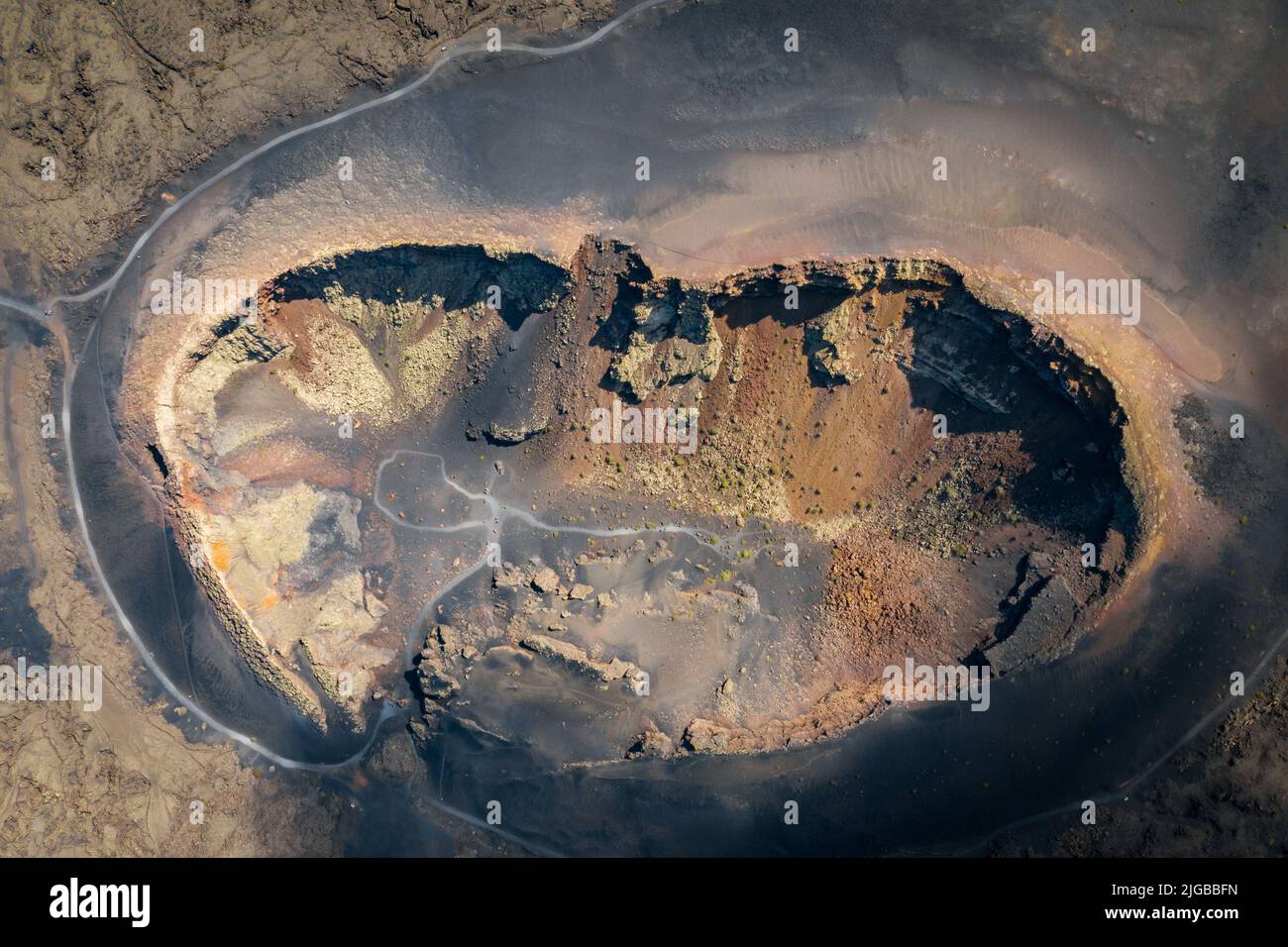 top down aerial view volcano el cuervo and black volcanic soil Stock ...