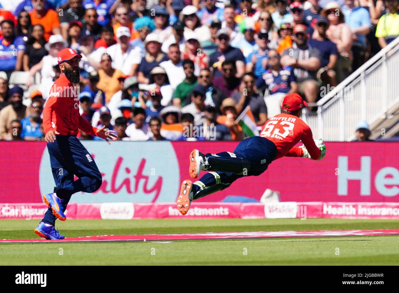 England’s Joe Butler takes a catch to take the wicket of India’s Rohit ...