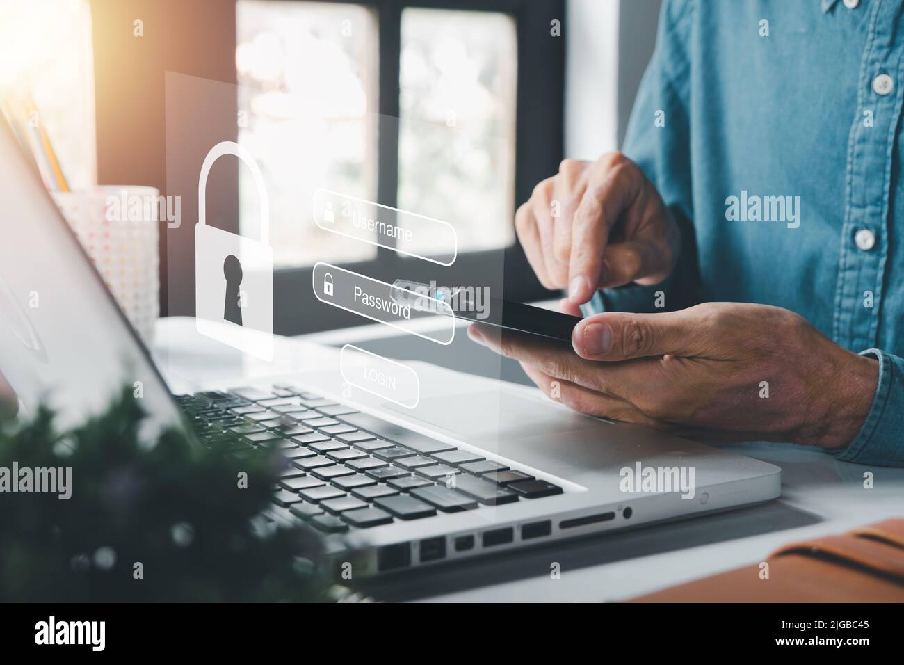 Man hand using smartphone with login and password on screen display ...