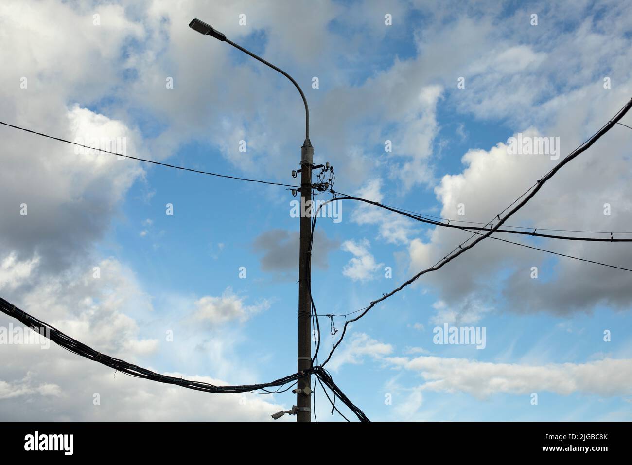 Electrical wires and pole. City light. Electric infrastructure in city ...