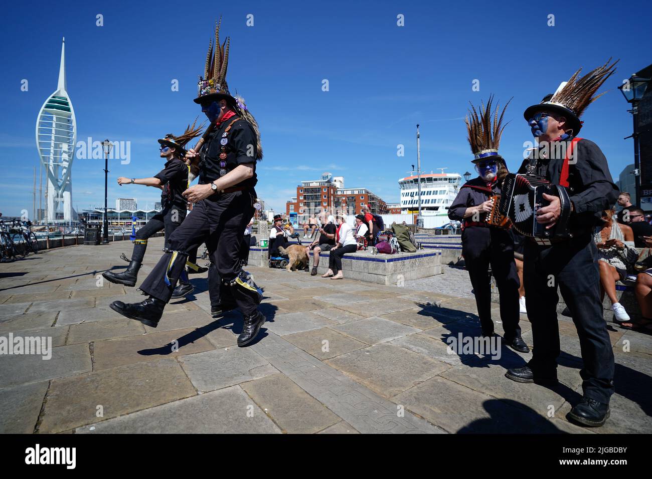 Members of the Hook Eagle Morris Men perform on The Point in Old ...