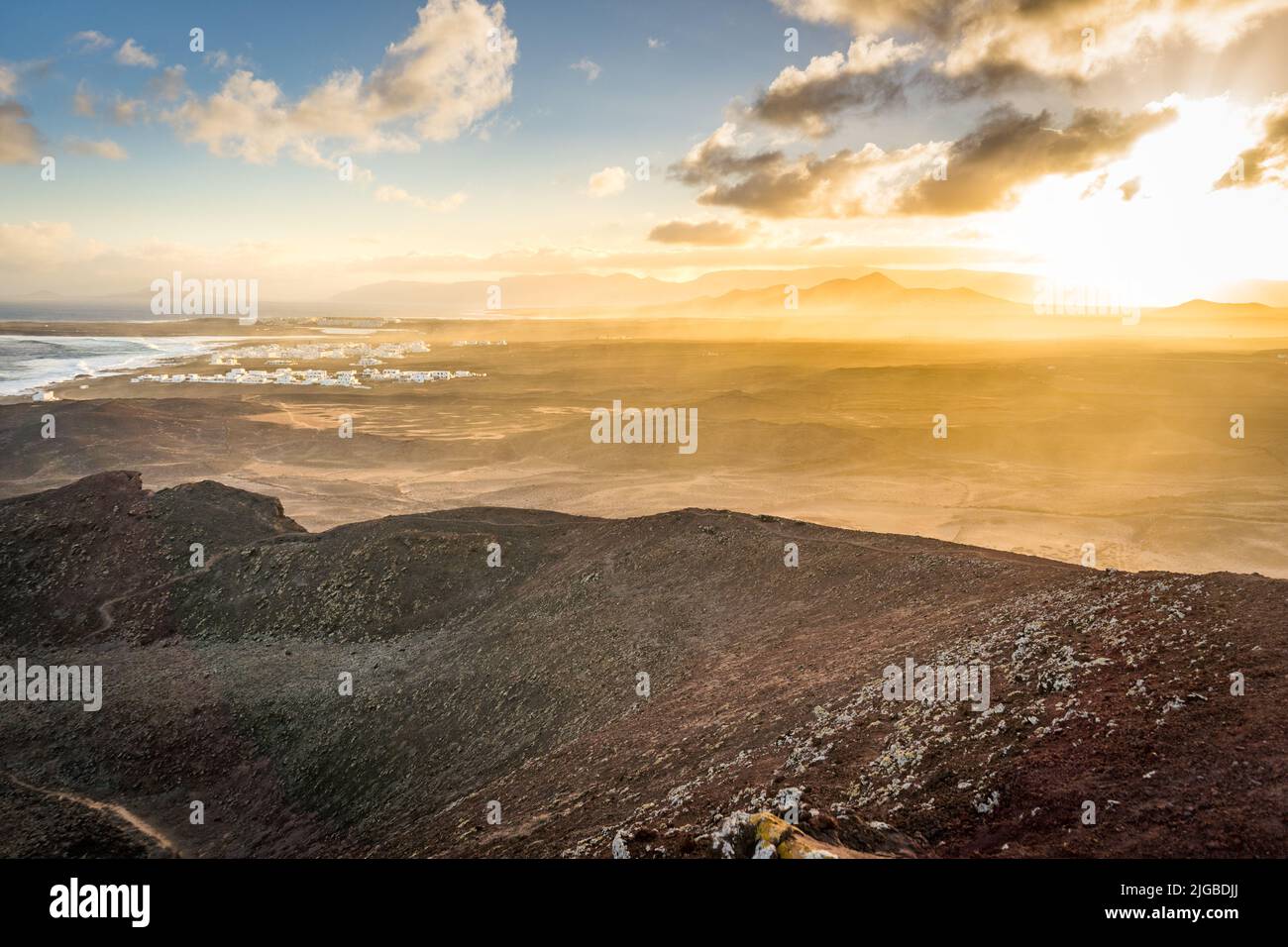 aerial view of volcano and village on lanzarote landscape during ...