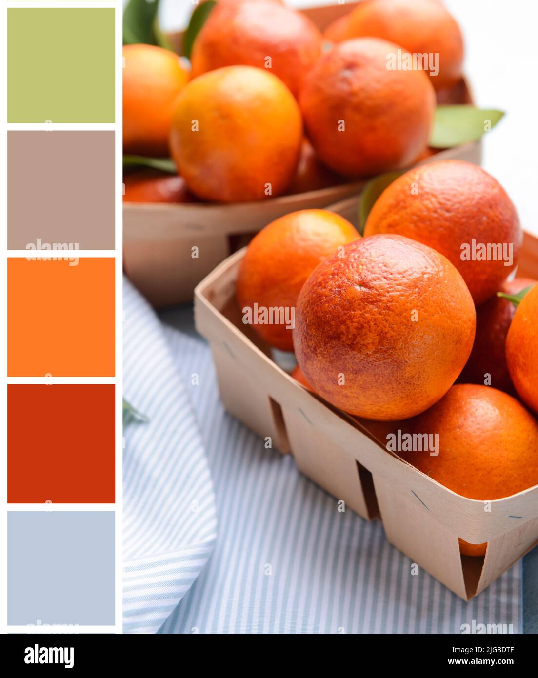 Box with fresh blood oranges on table. Different color samples Stock ...