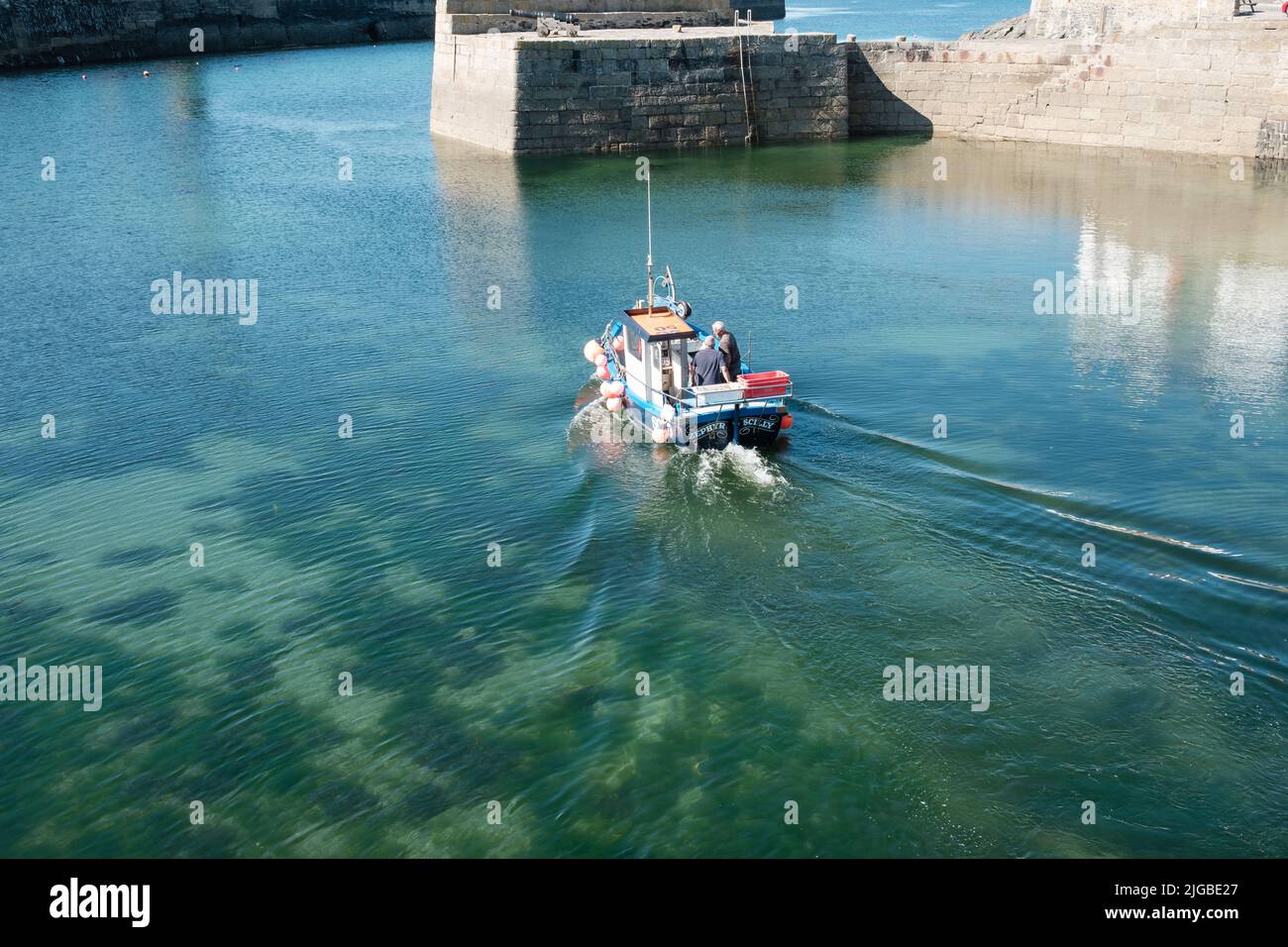 Boats leaving Porthleven Harbour, Cornwall Stock Photo - Alamy