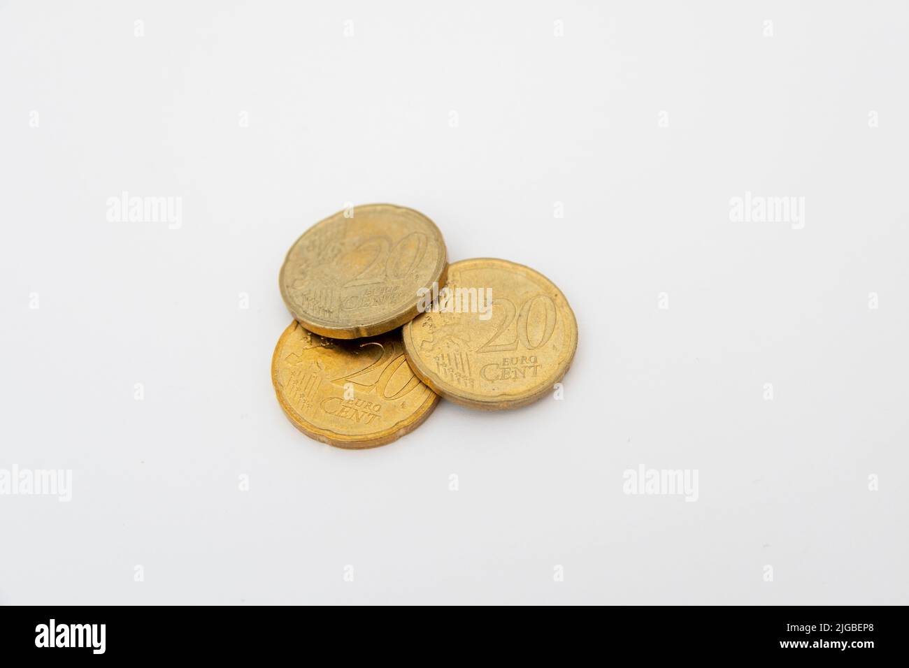 Euro coins lying on a white background Stock Photo - Alamy