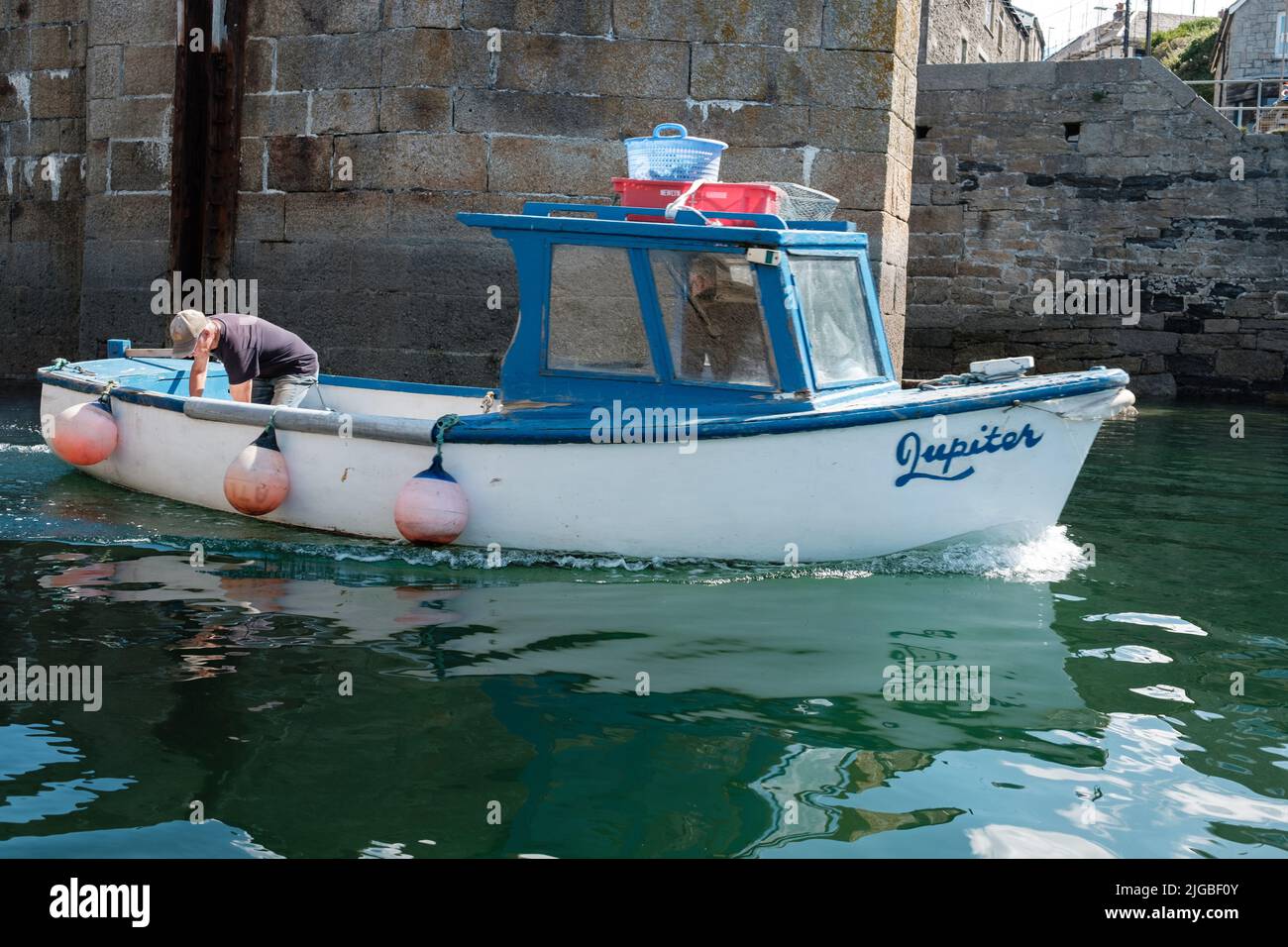 Boats leaving Porthleven Harbour, Cornwall Stock Photo - Alamy
