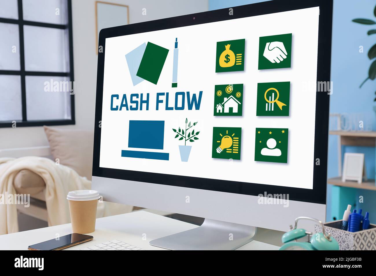 Modern computer on table in room. Cash flow Stock Photo - Alamy