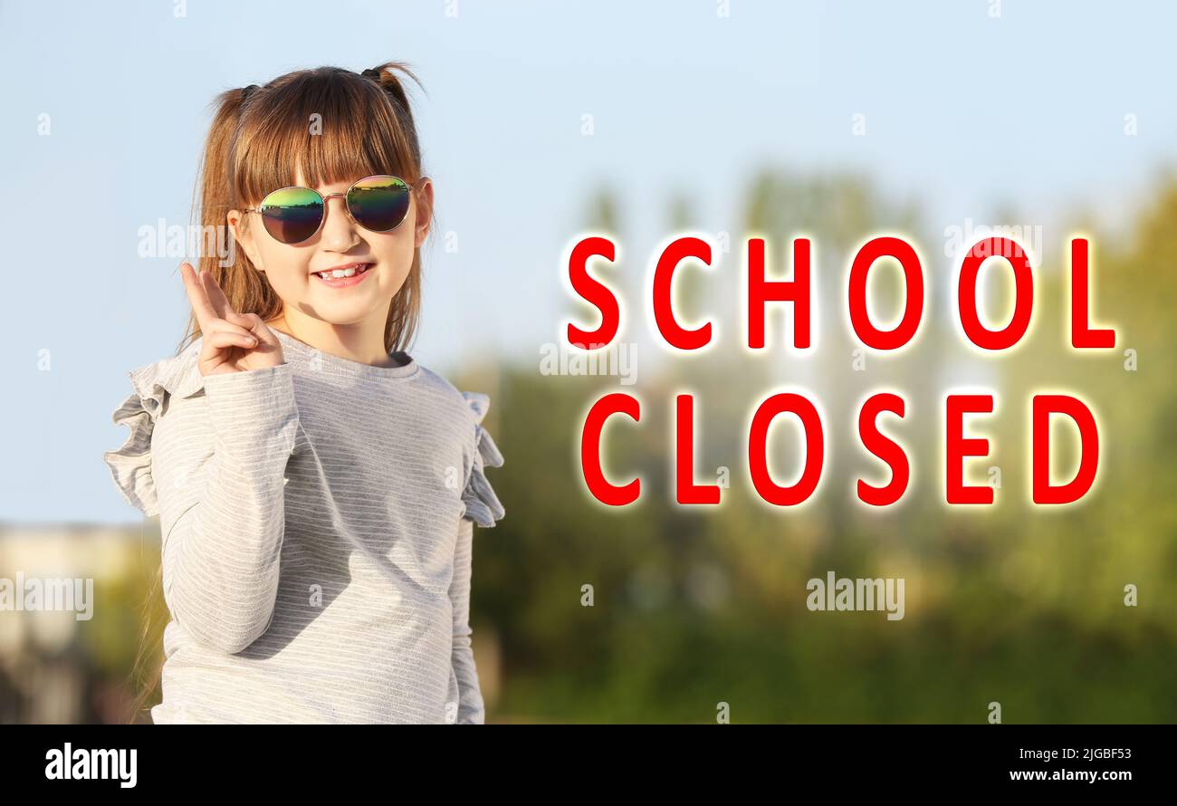Text SCHOOL CLOSED and cute little girl with sunglasses outdoors Stock ...
