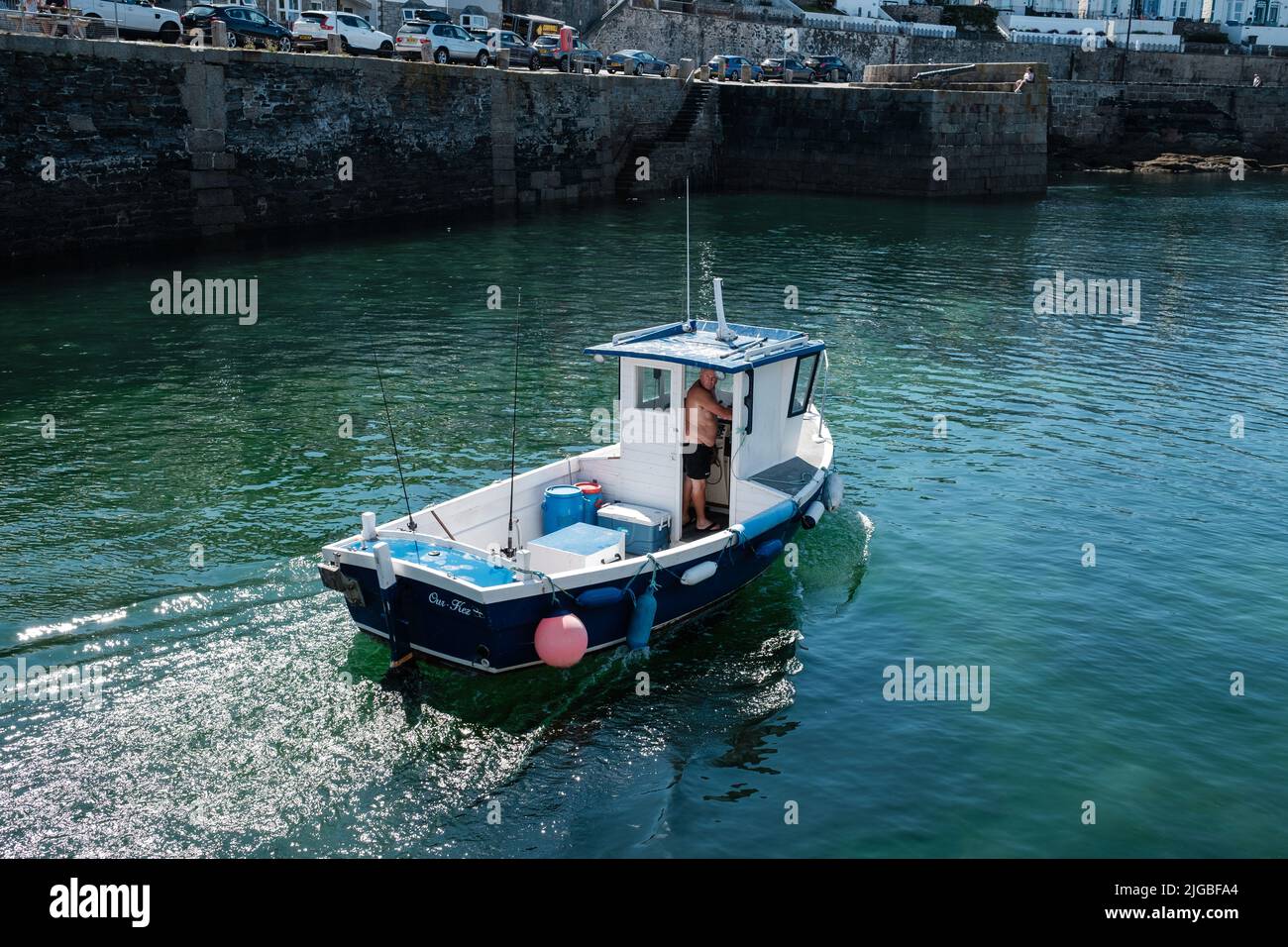Boats leaving Porthleven Harbour, Cornwall Stock Photo - Alamy